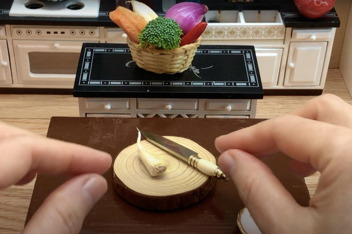 Don't judge the size! This miniature knife is as sharp as real one ...